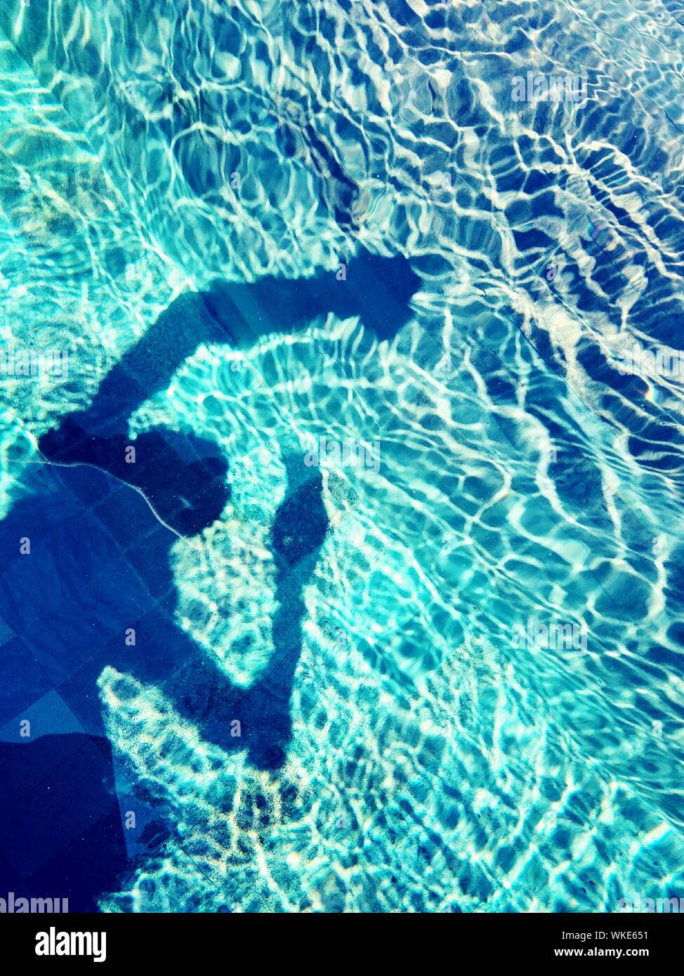 Summer blue pool shadow hi-res stock photography and images - Alamy