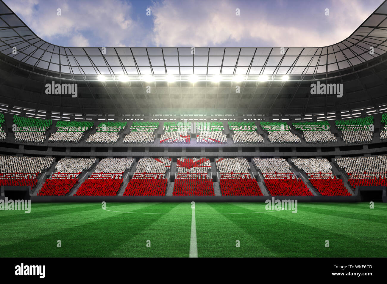 Digitally generated iran national flag against large football stadium ...