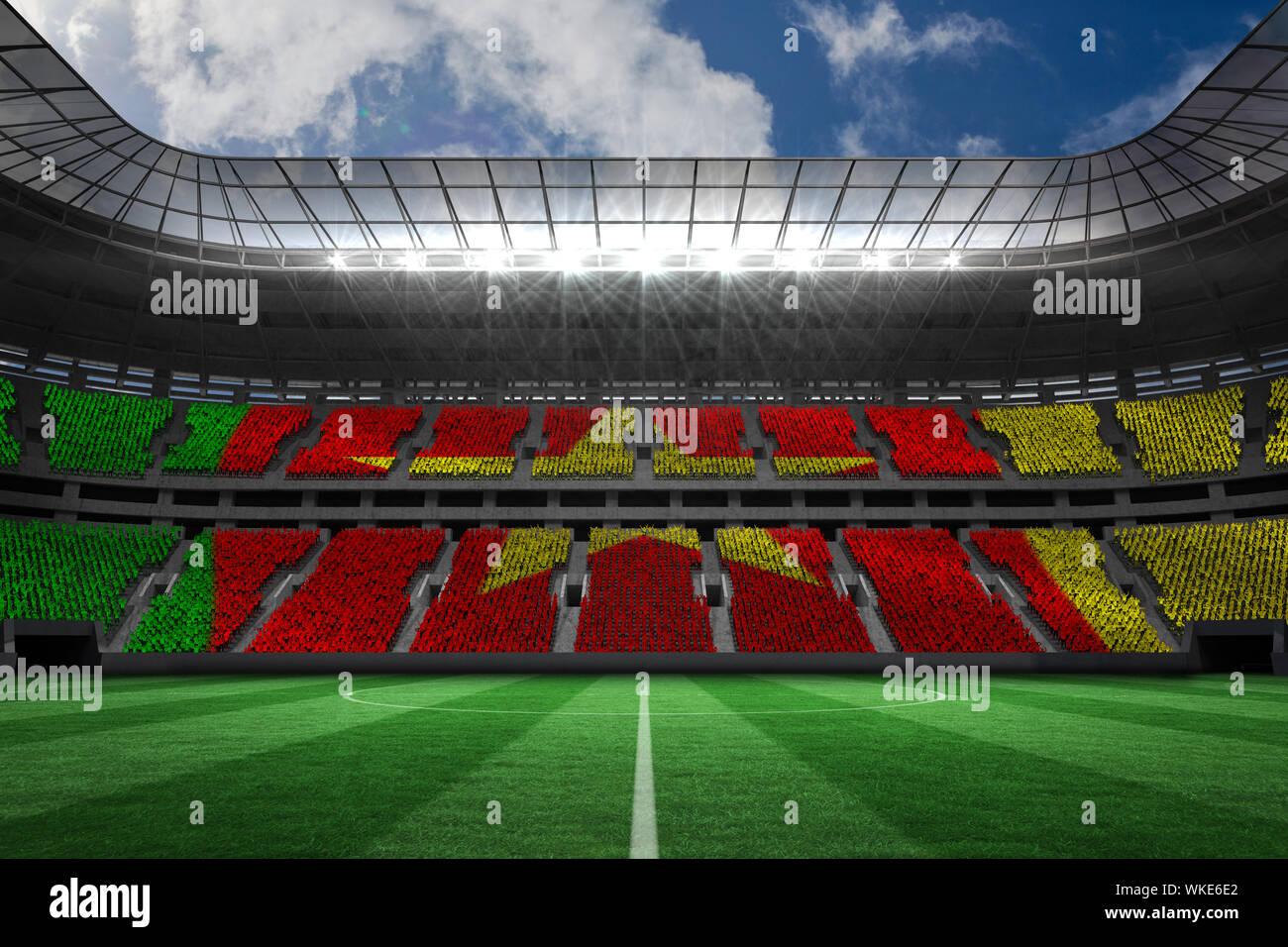 Digitally generated cameroon national flag against large football ...