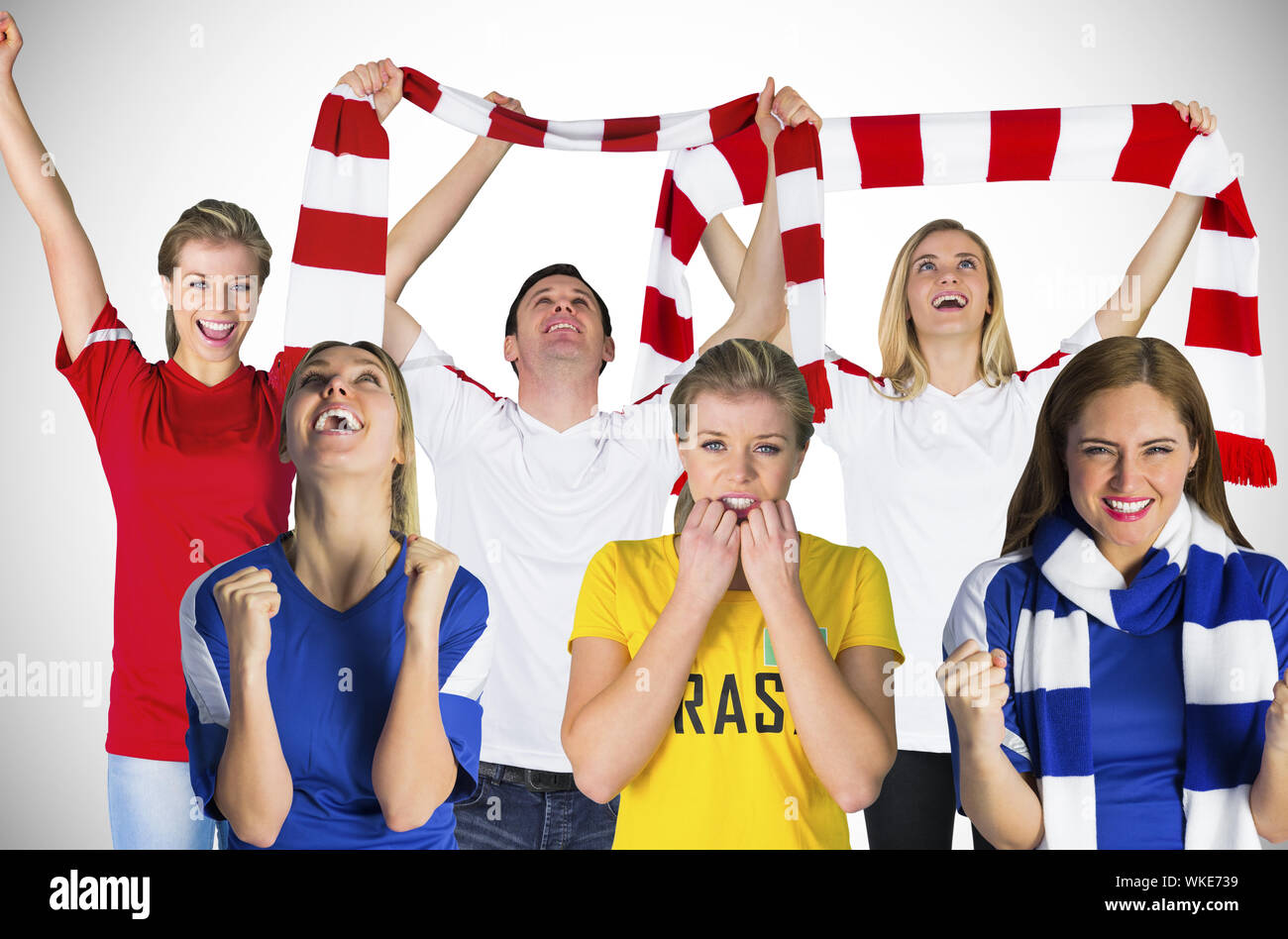 Composite image of football fans against white background with vignette ...