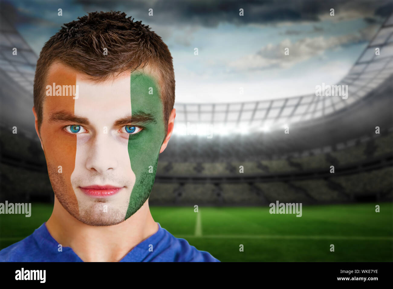 Composite image of serious young ivory coast fan with face paint ...
