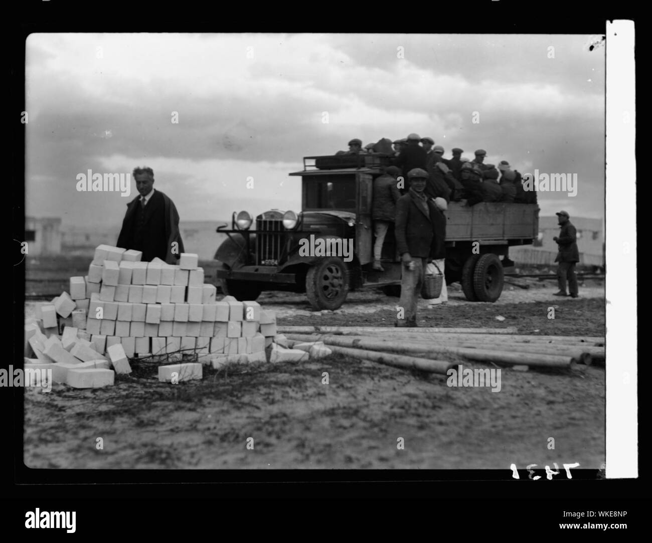 Jewish colonies. Haifa Bay project. Building & sand tractors Stock ...