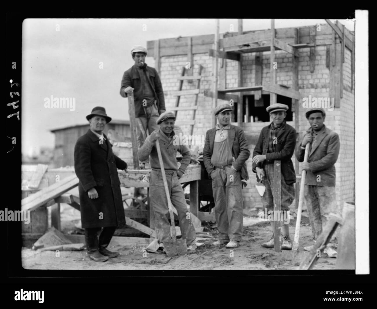 Jewish colonies. Haifa Bay project. Building & sand tractors Stock ...