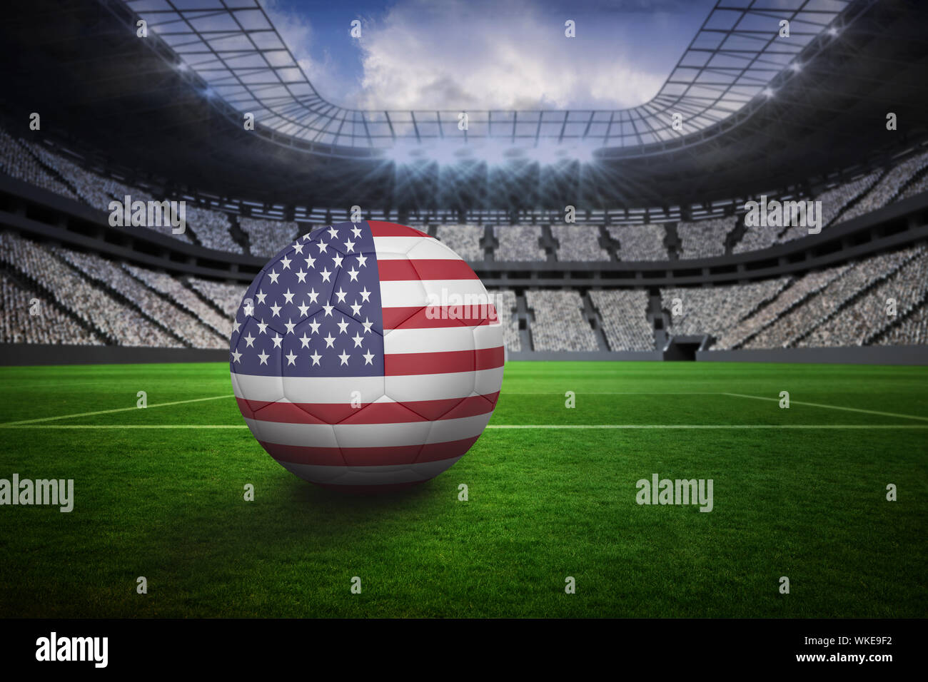 Football in america colours in vast football stadium with fans in white ...