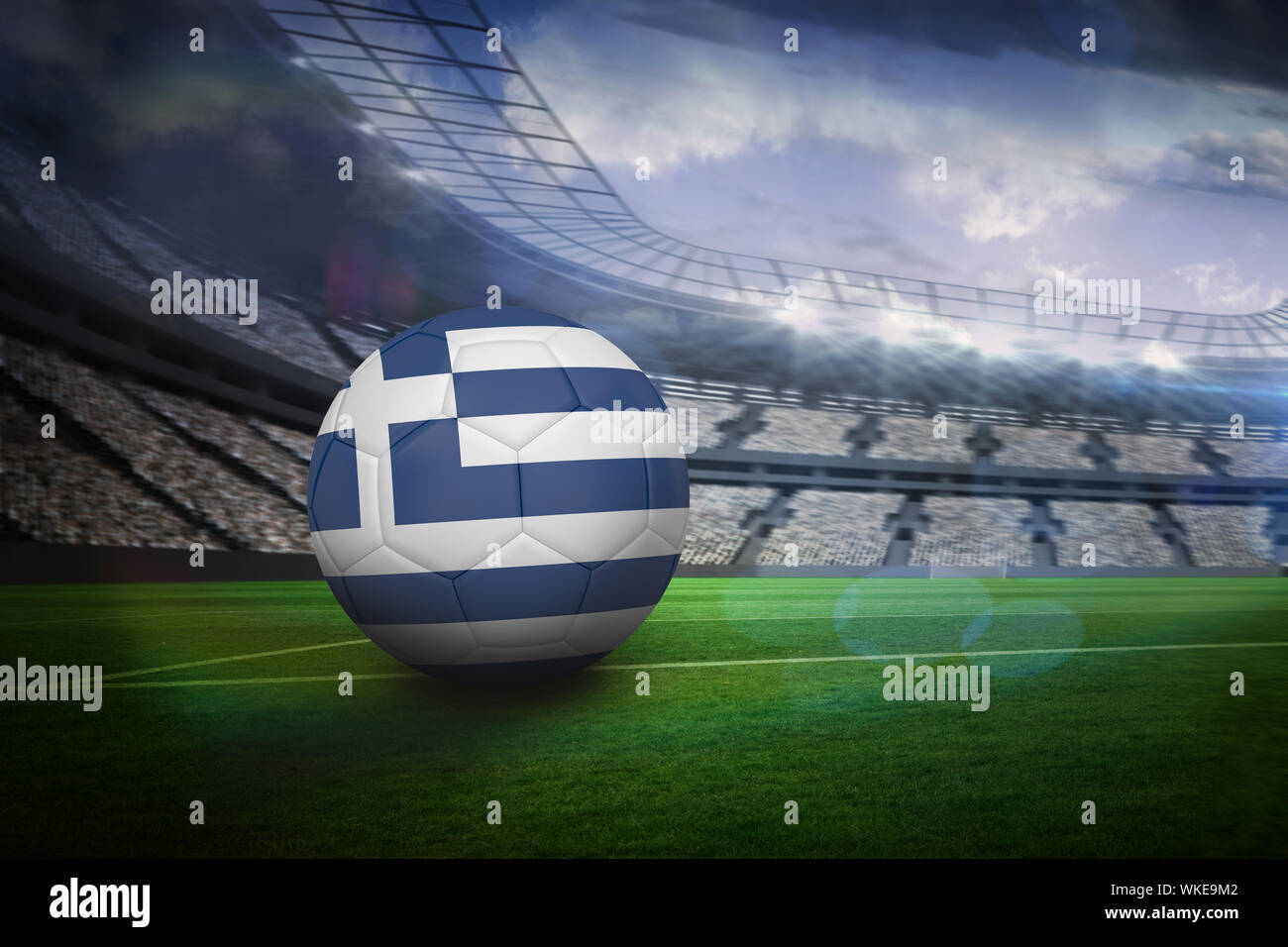 Football in greece colours in large football stadium with lights Stock ...