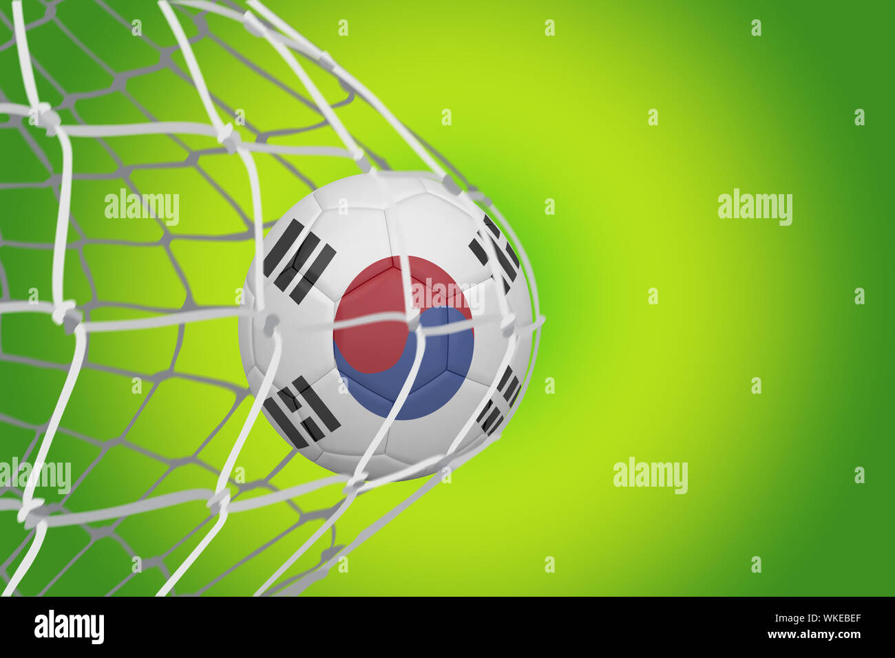 Football in south korea colours at back of net against green vignette ...