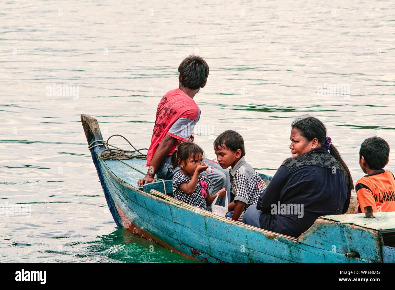 Indonesia boat boys hi-res stock photography and images - Alamy