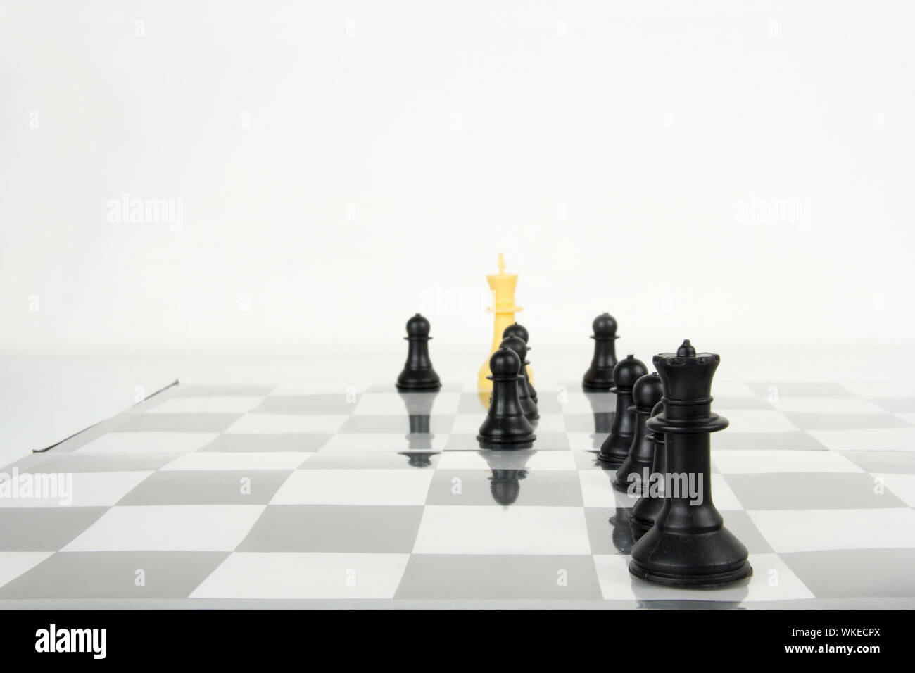 White king trapped by pawns Stock Photo - Alamy