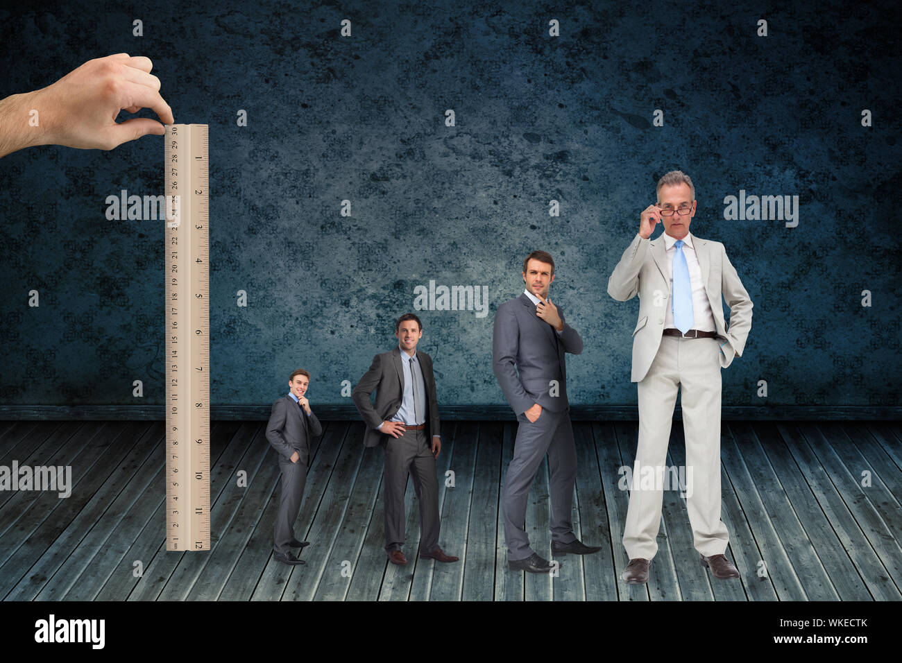 Composite image of hand measuring stages of businessmans life with ...