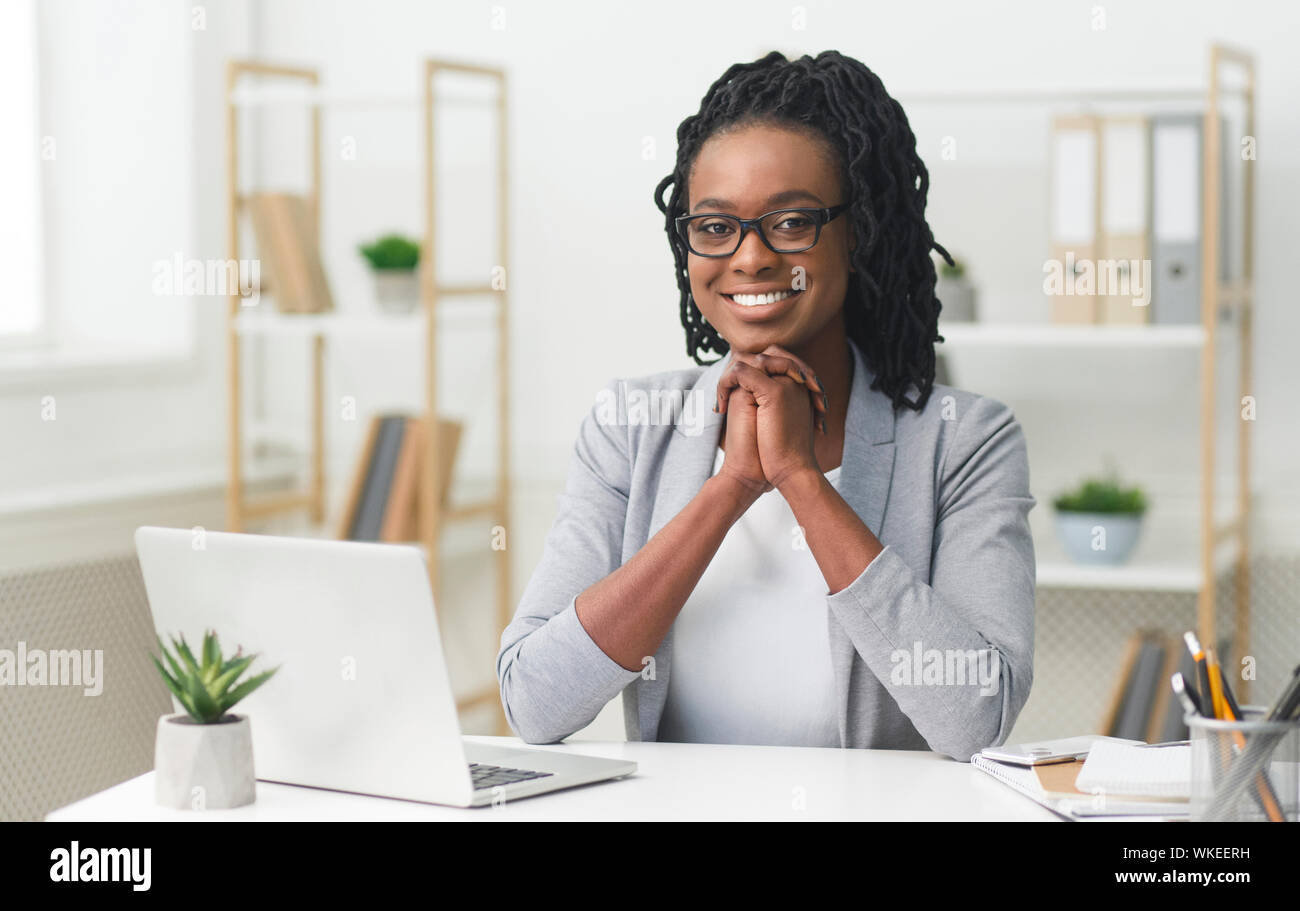 Smiling Office Girl Posing At Camera Sitting At Workplace Stock Photo ...