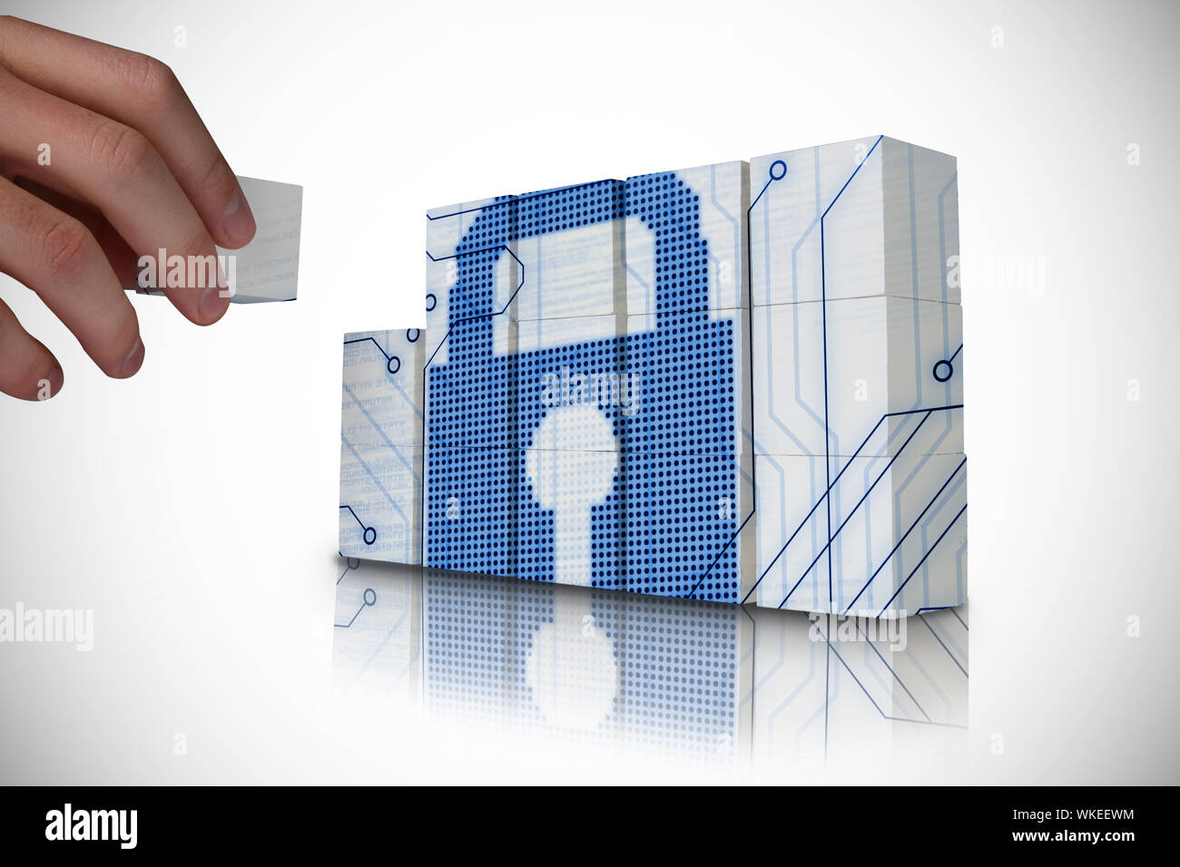 Hand building wall showing blue padlock on white background Stock Photo ...