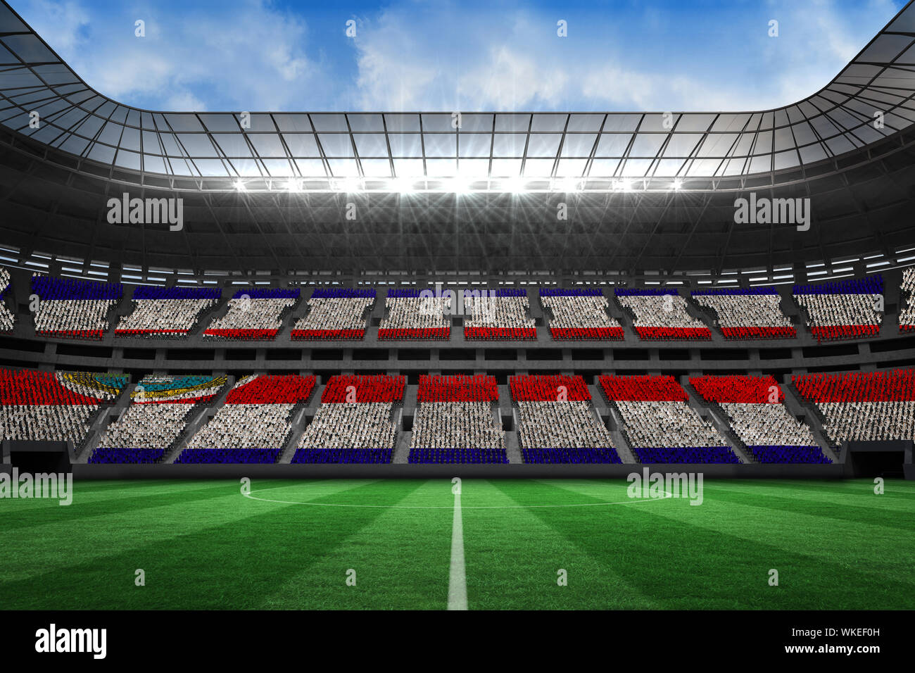 Costa rica national flag in large football stadium with white fans ...