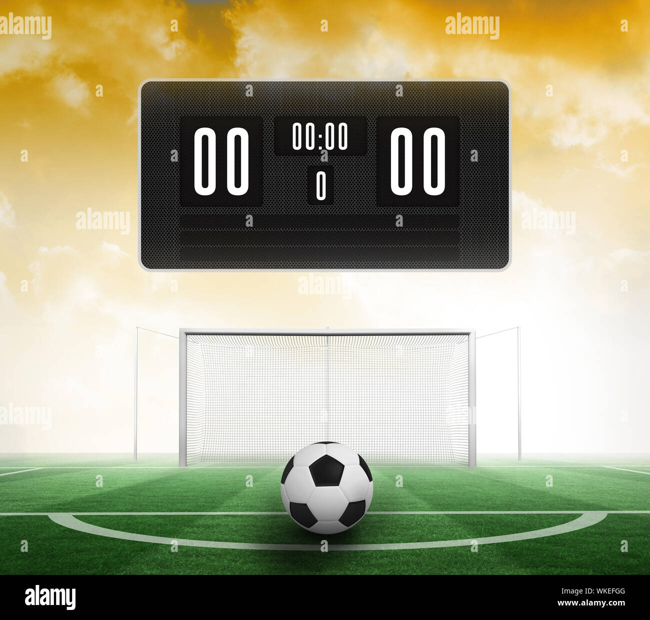 Black scoreboard with no score and football against football pitch ...