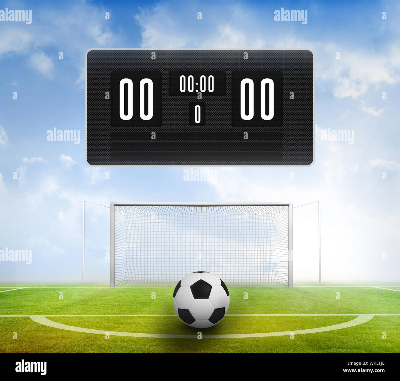 Black scoreboard with no score and football against football pitch ...