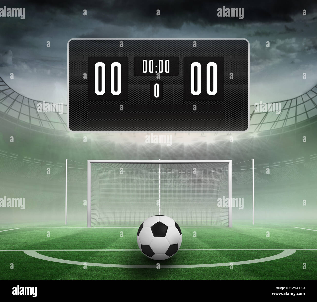 Black scoreboard with no score and football against football pitch in ...