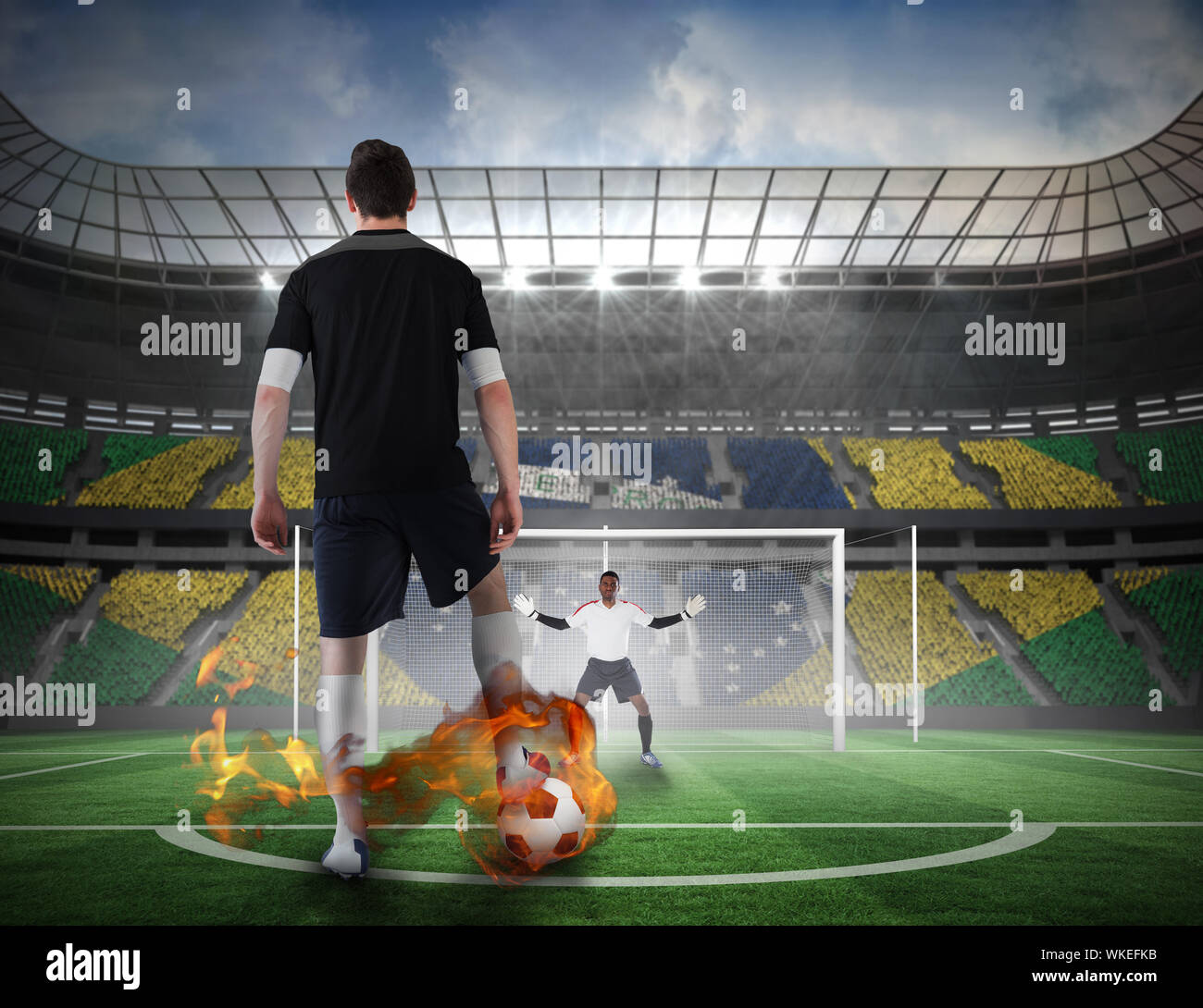 Composite image of football player about to take a penalty against ...