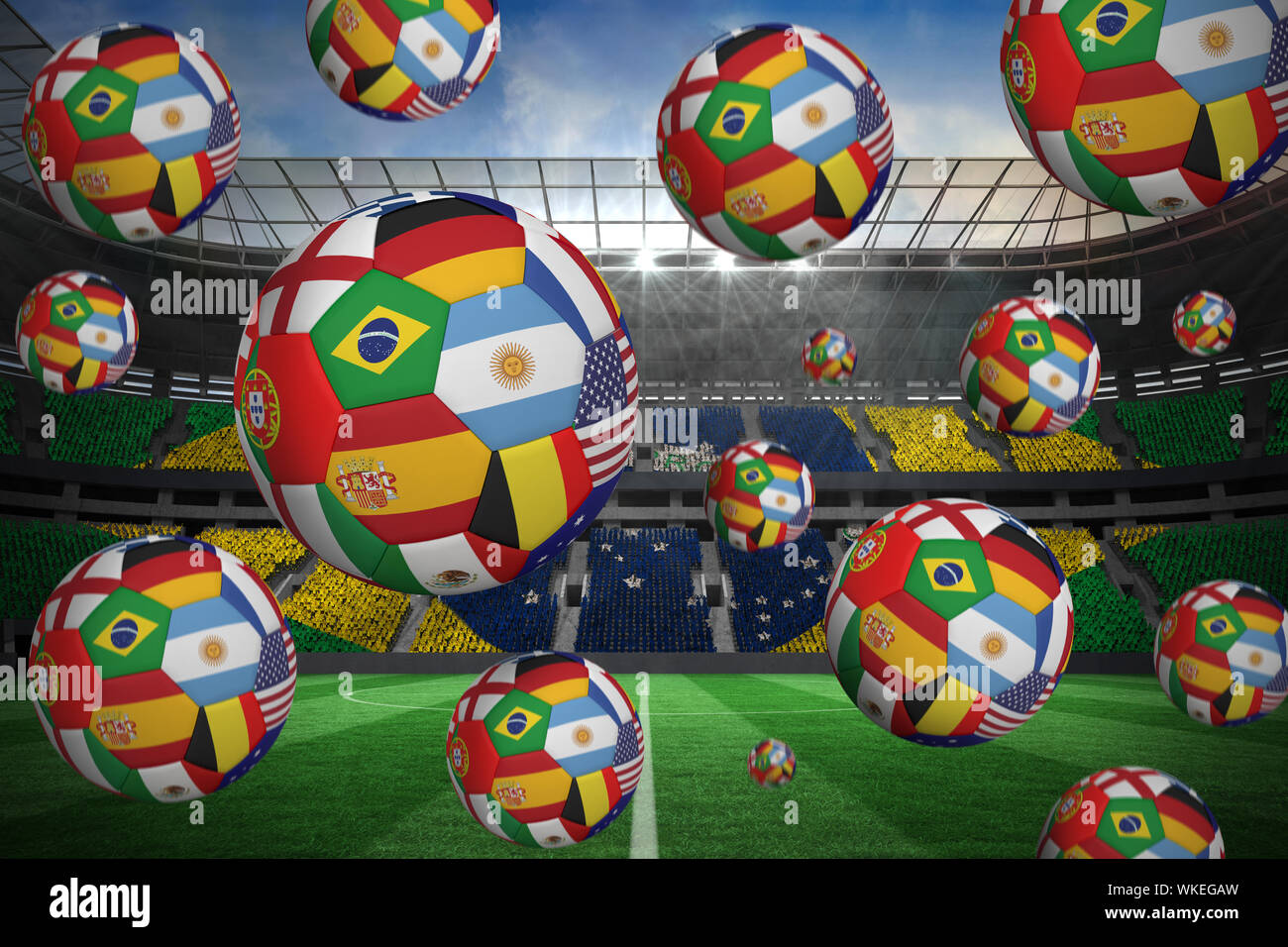 Footballs in international flags against large football stadium with ...