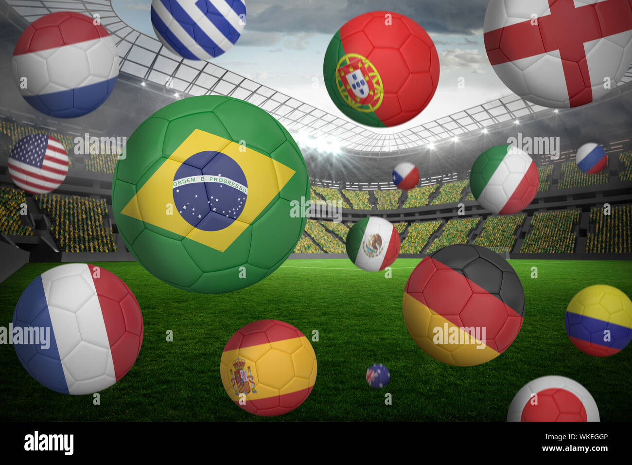 Footballs in various flag colours against large football stadium with ...