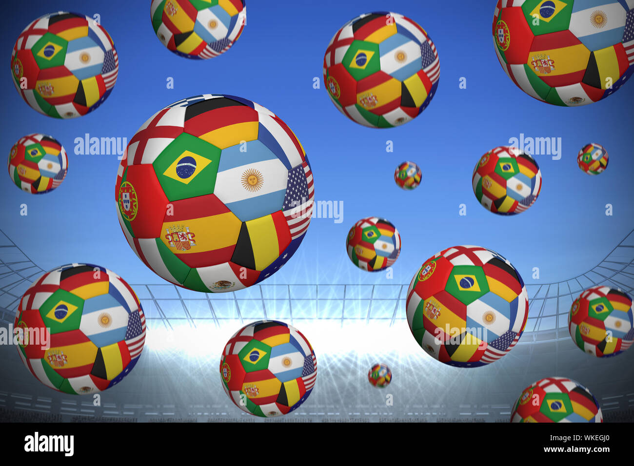 Footballs in international flags against large football stadium under ...