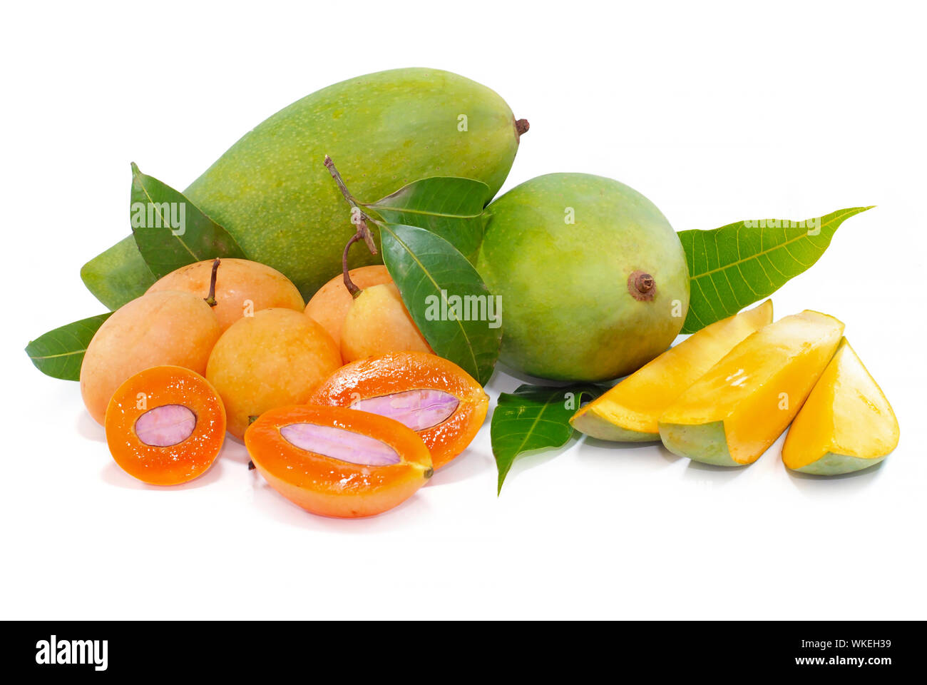 Green mango fruit cut out on white background Stock Photo - Alamy