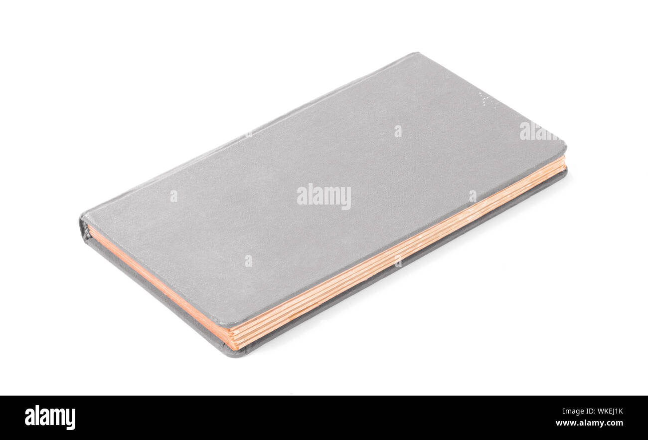 Closed old grey book isolated on white background Stock Photo - Alamy