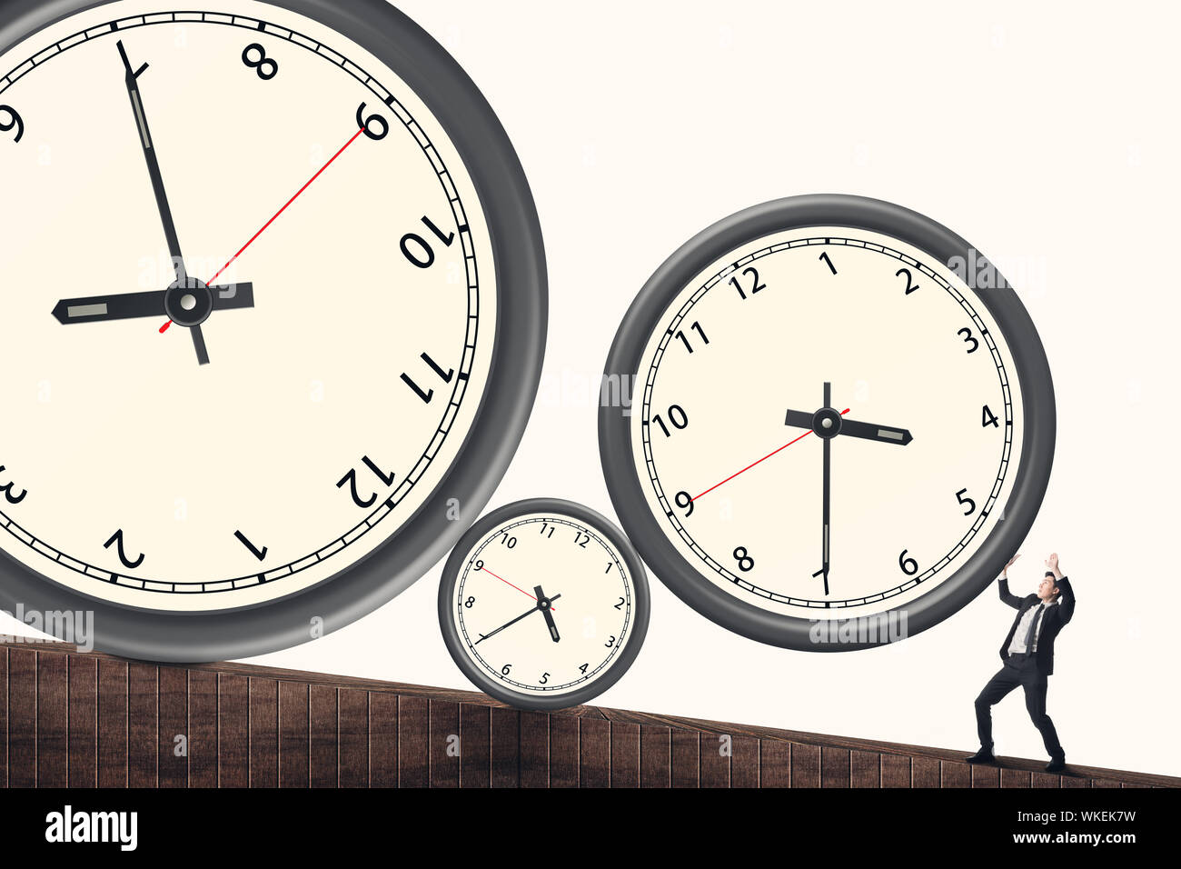 Time pressure concept, Asian business man face the rolling clock Stock ...