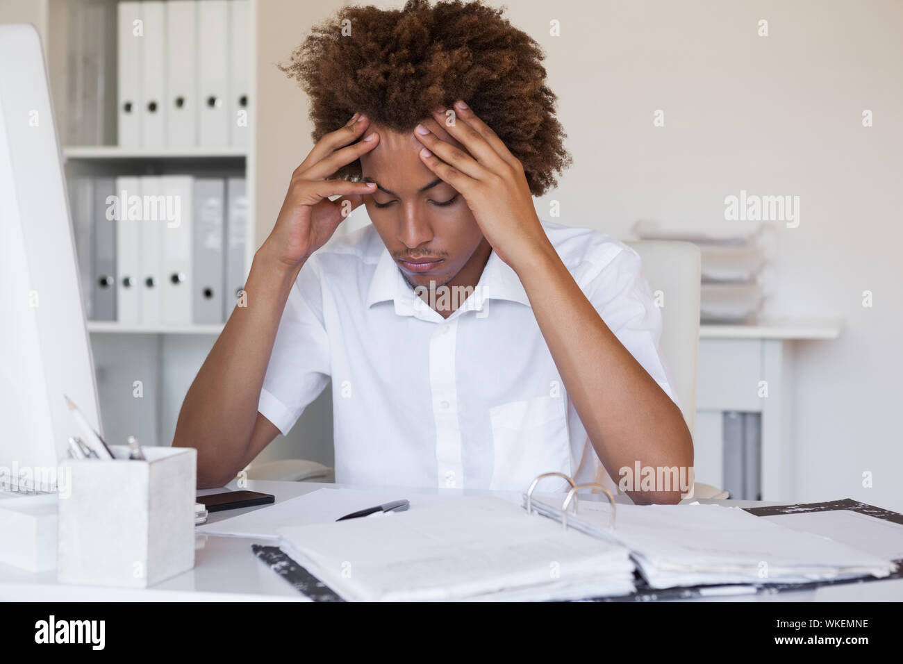 Man office sitting down desk chair hi-res stock photography and images ...