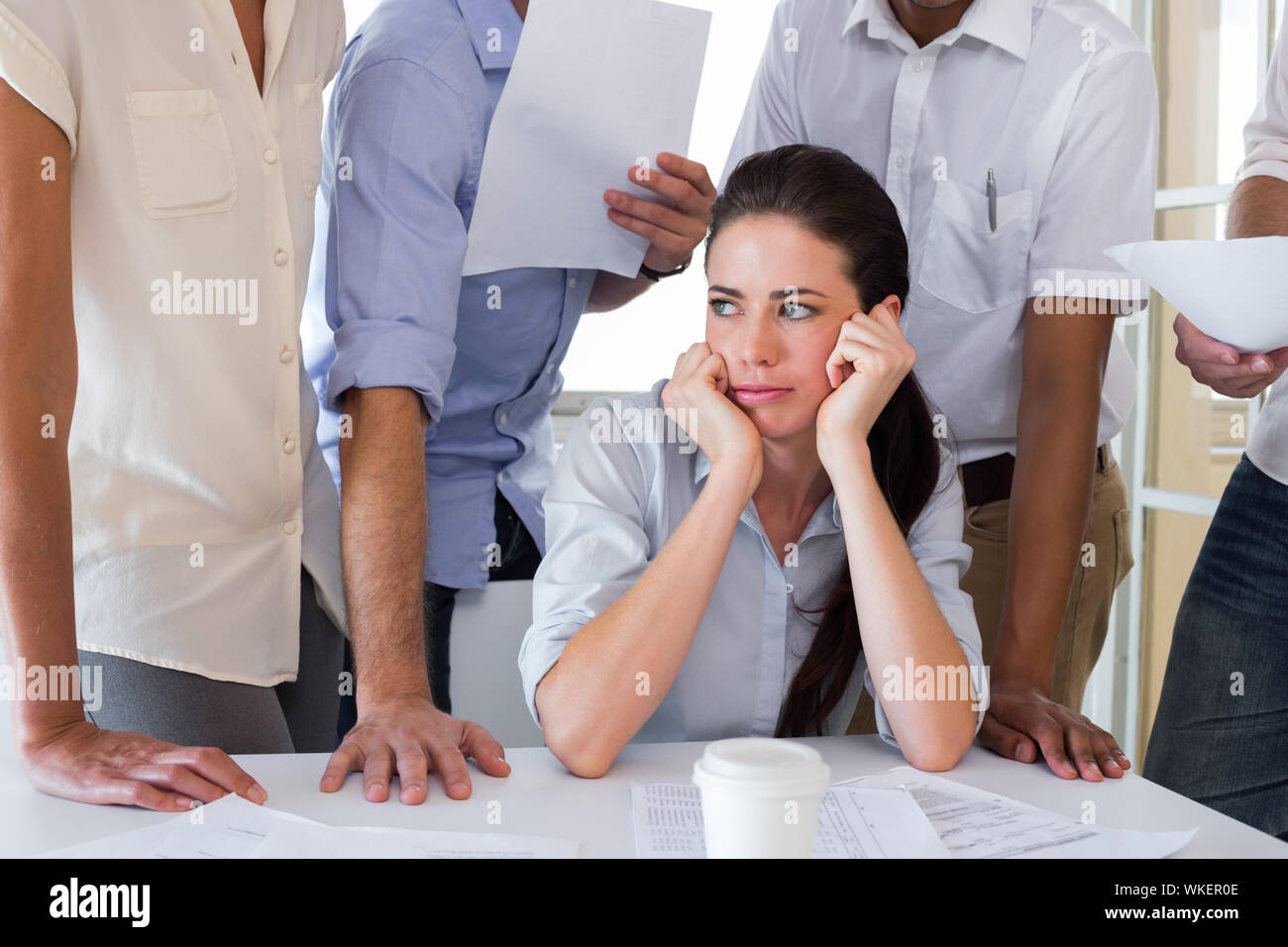 Woman surrounded by paperwork hi-res stock photography and images - Alamy