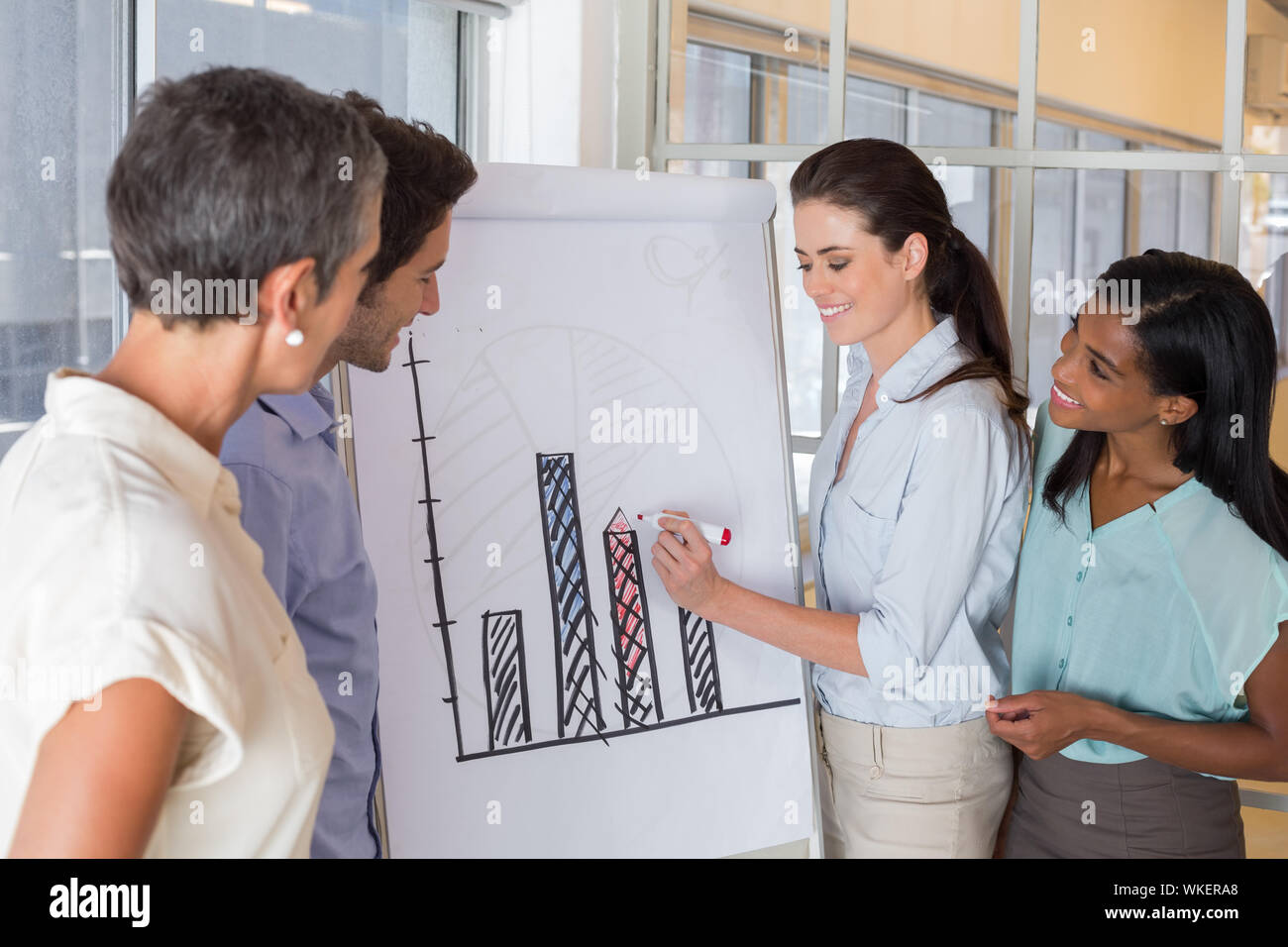 Business people working on graph for presentation in the office Stock ...