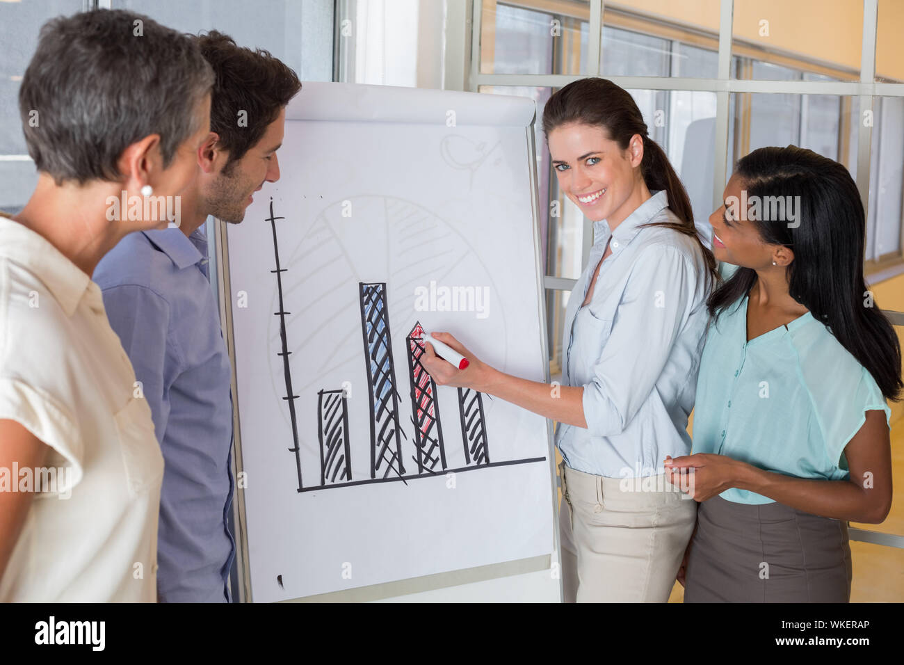 Business people working on graph for presentation in the office Stock ...