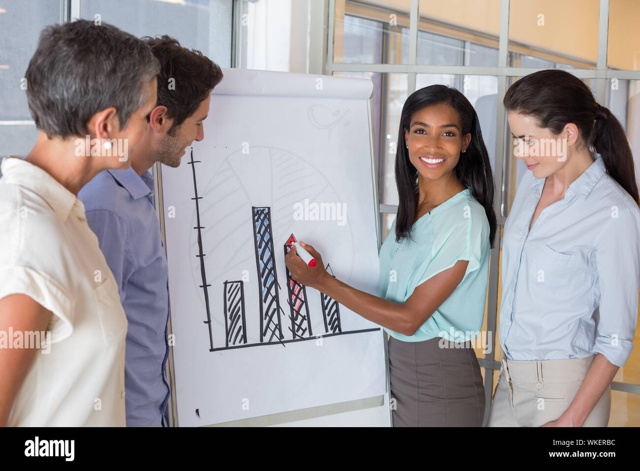 Business people working on graph for presentation in the office Stock ...