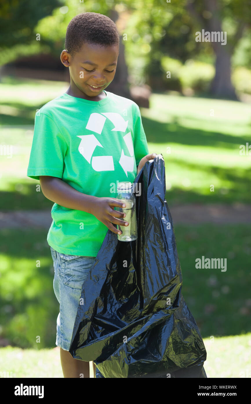 Boy holding trash bag hi-res stock photography and images - Alamy