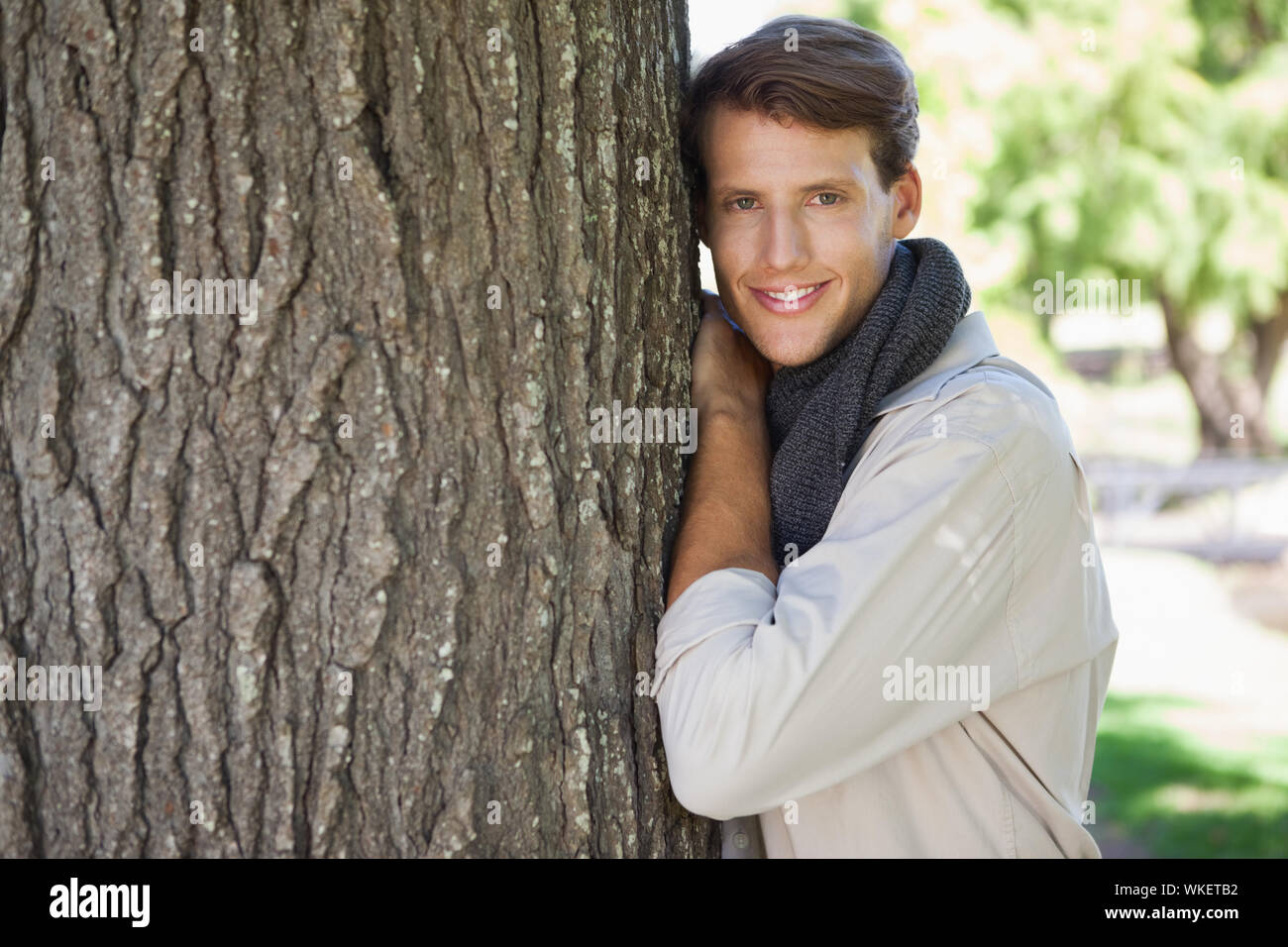 Man leaning against tree hi-res stock photography and images - Alamy