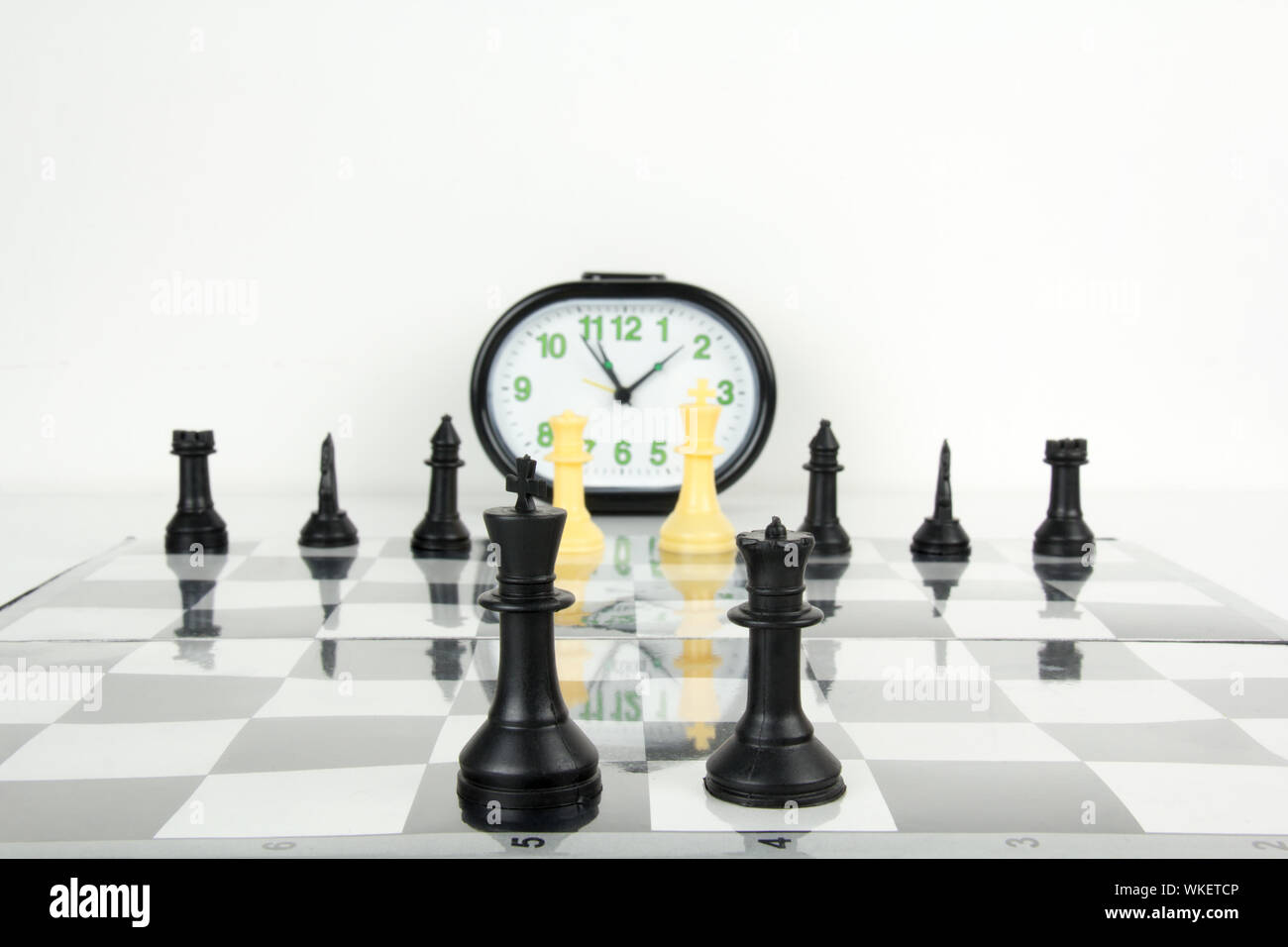 White King and Queen trapped on a chessboard Stock Photo - Alamy