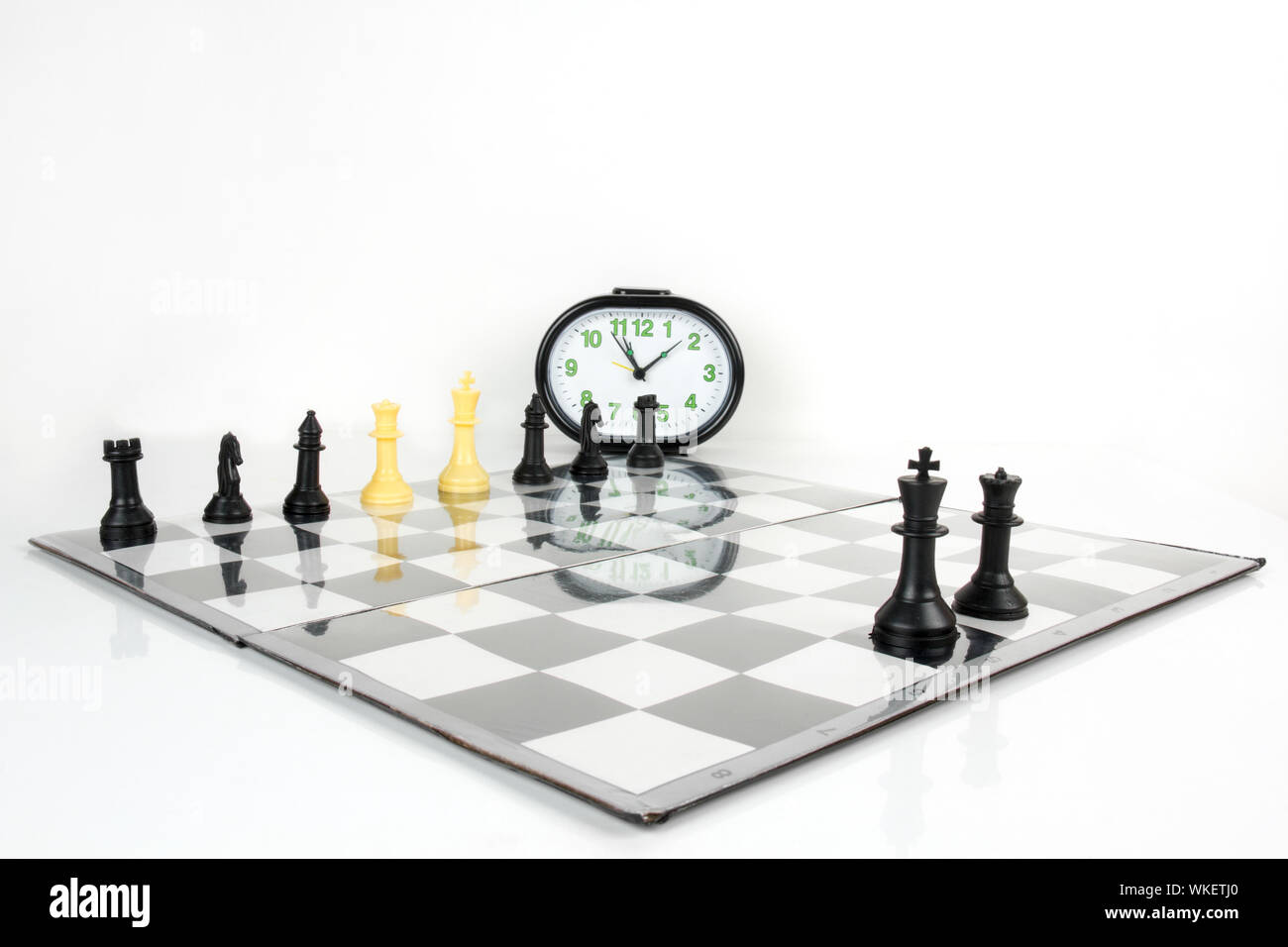 White king and Queen trapped on a chess board Stock Photo - Alamy