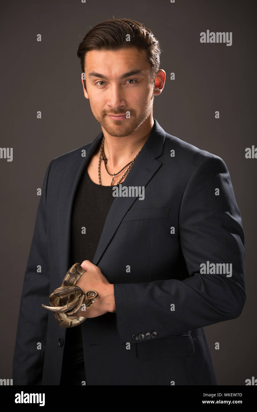 Smiling Person With Snake High Resolution Stock Photography and Images ...