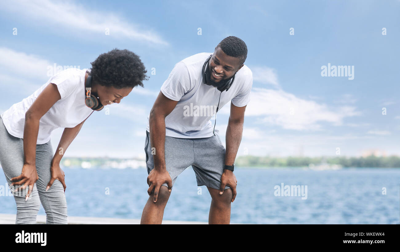African American Spouses Resting During Morning Run Outside Stock Photo ...