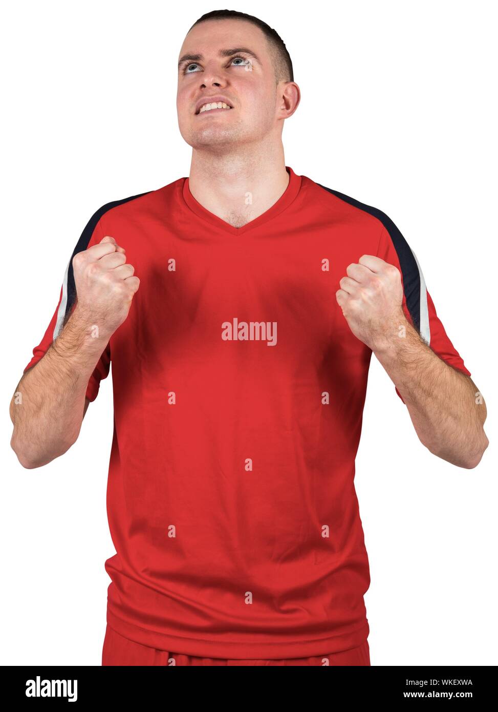 Excited football player cheering on white background Stock Photo - Alamy