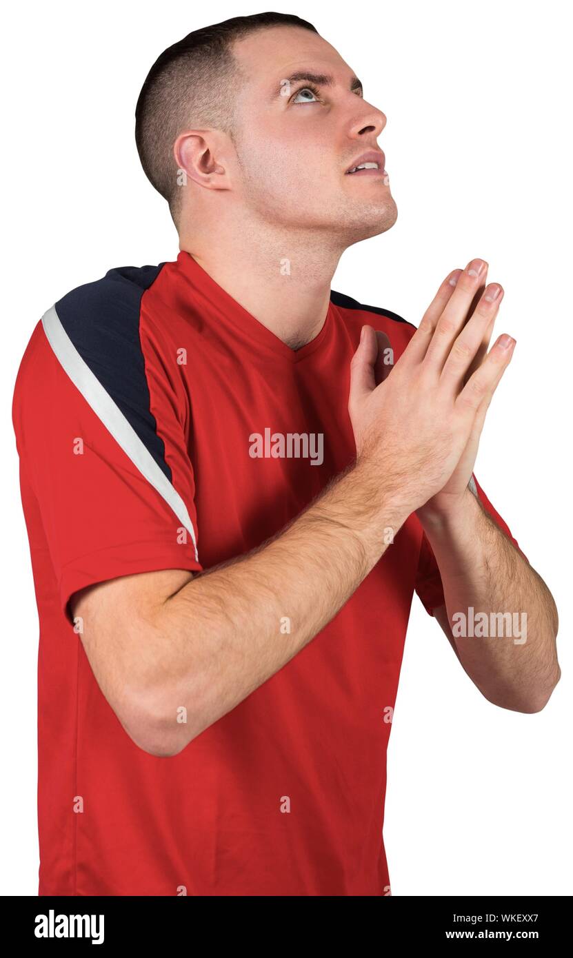 Nervous football player looking ahead on white background Stock Photo ...