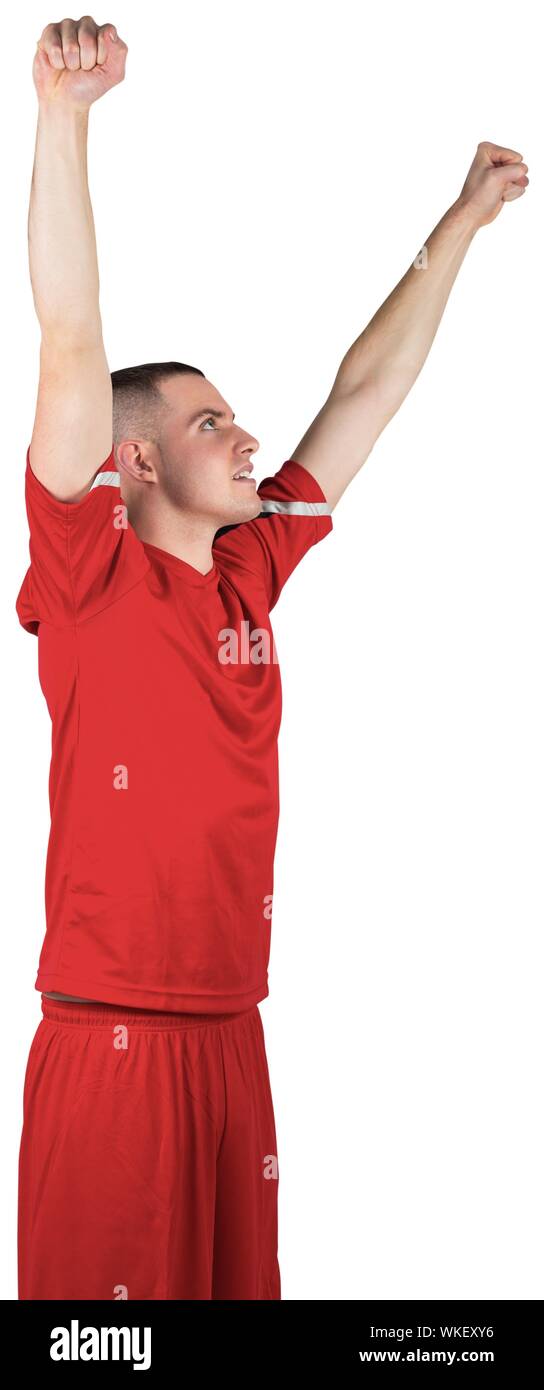 Excited football player cheering on white background Stock Photo - Alamy