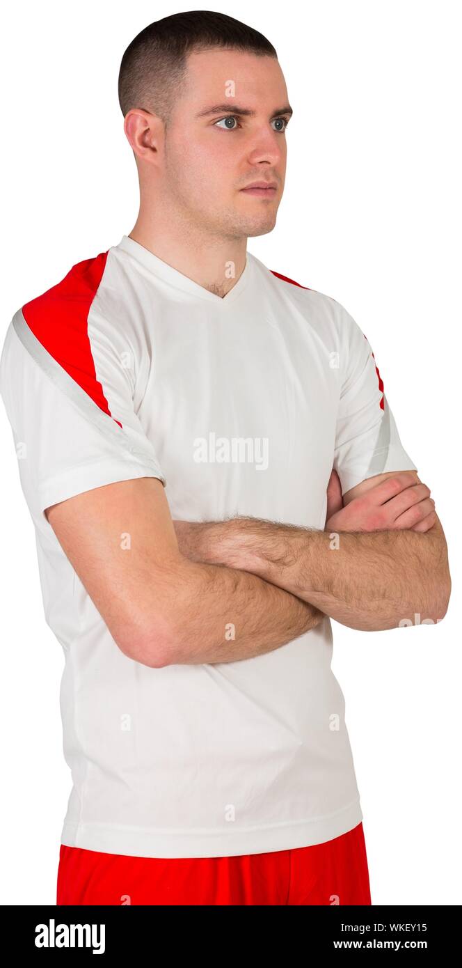 Handsome football player with arms crossed on white background Stock ...
