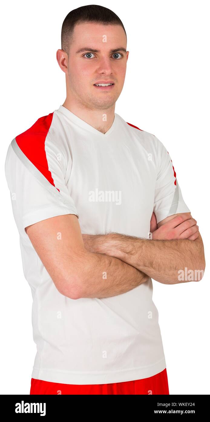 Handsome football player looking at camera on white background Stock ...