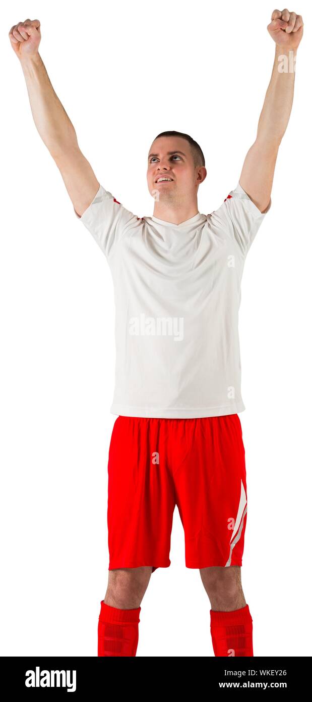 Excited football player cheering on white background Stock Photo - Alamy