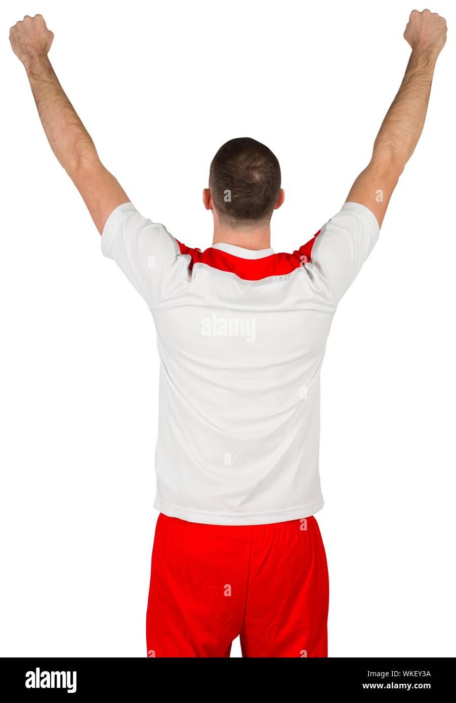 Excited football player cheering on white background Stock Photo - Alamy