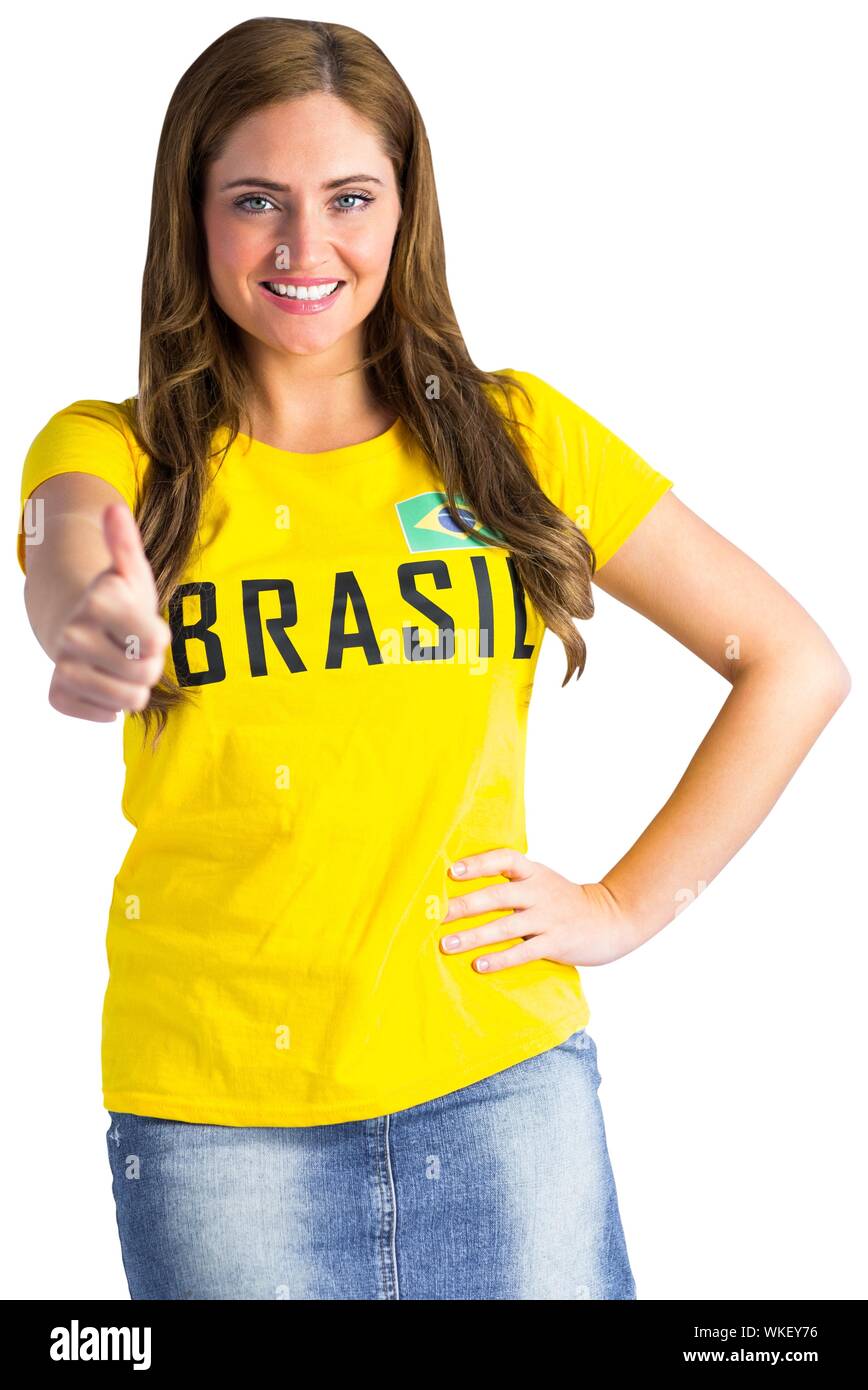 Pretty football fan in brasil t-shirt on white background Stock Photo ...