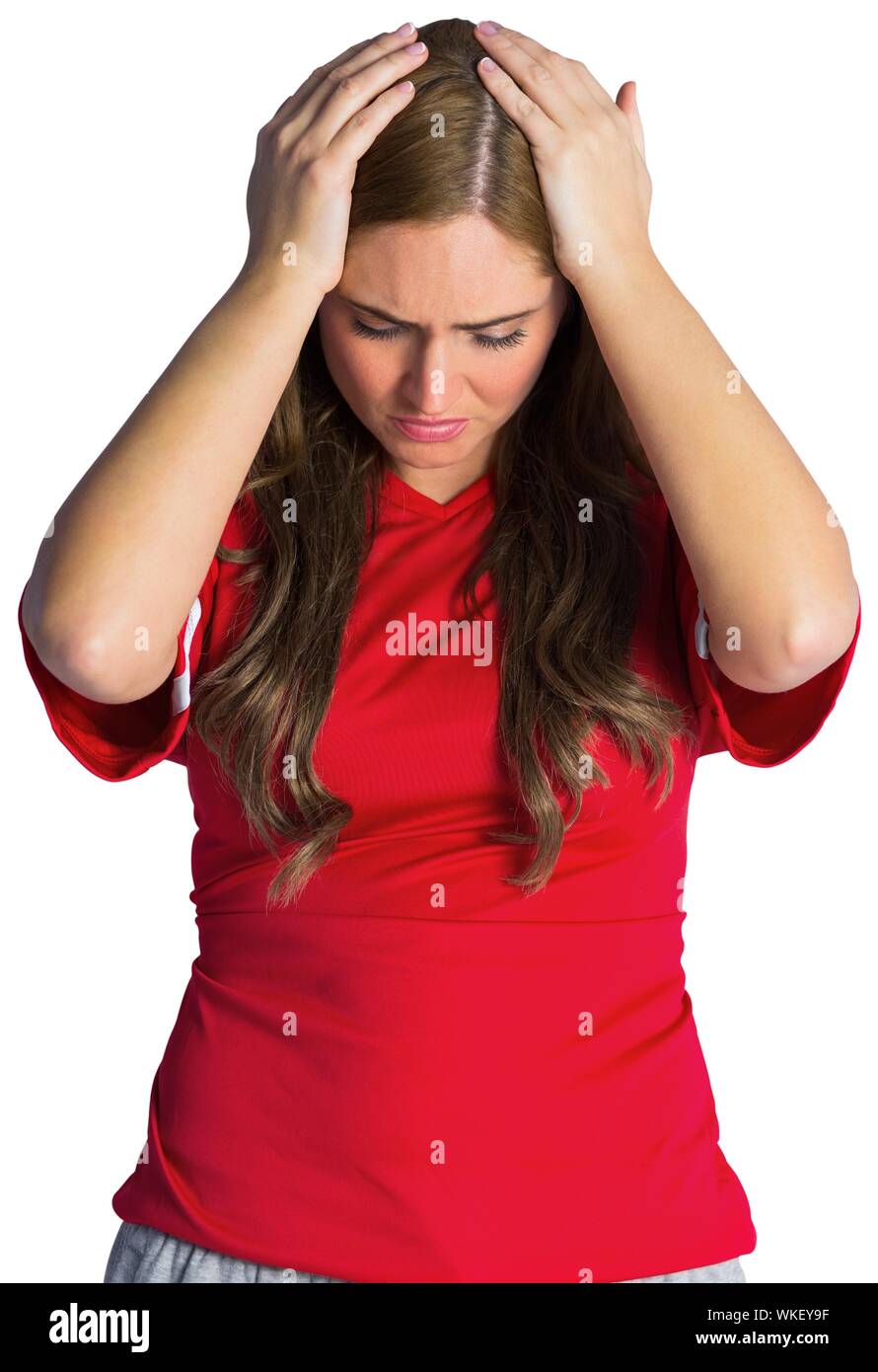 Disappointed football fan looking down on white background Stock Photo ...