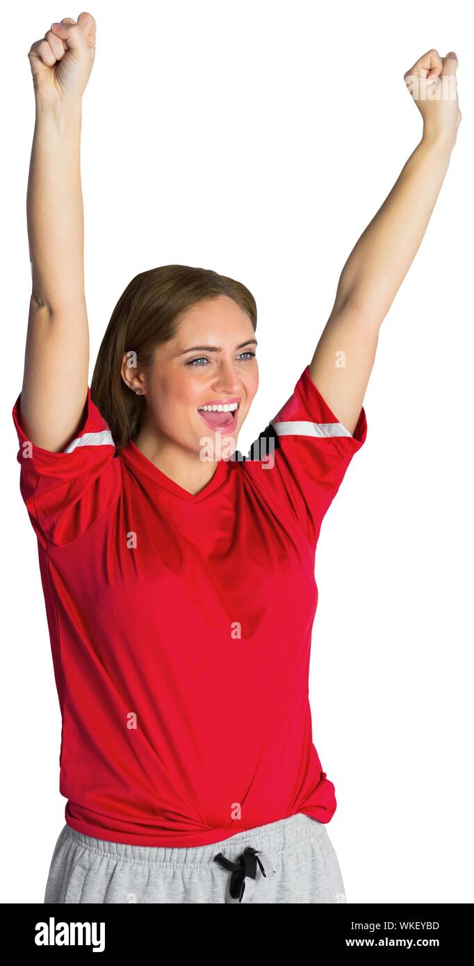 Pretty football fan cheering on white background Stock Photo - Alamy