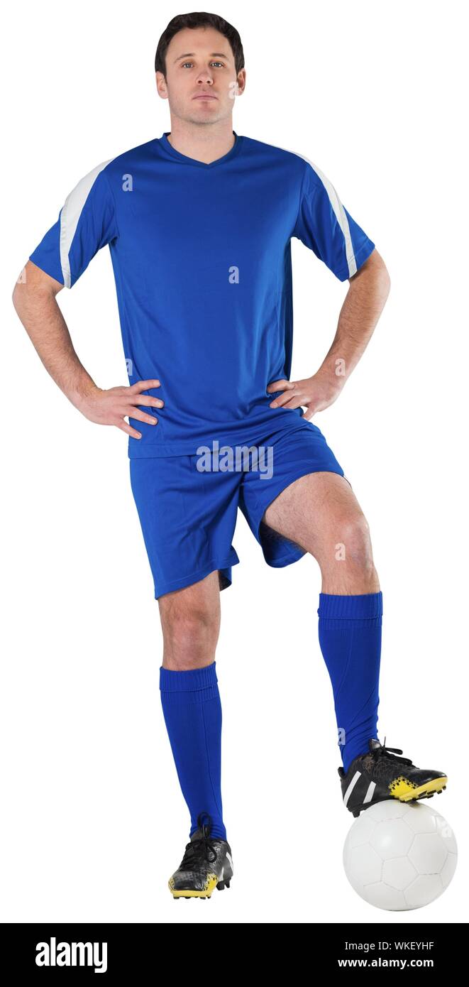 Football player in blue looking at camera on white background Stock ...