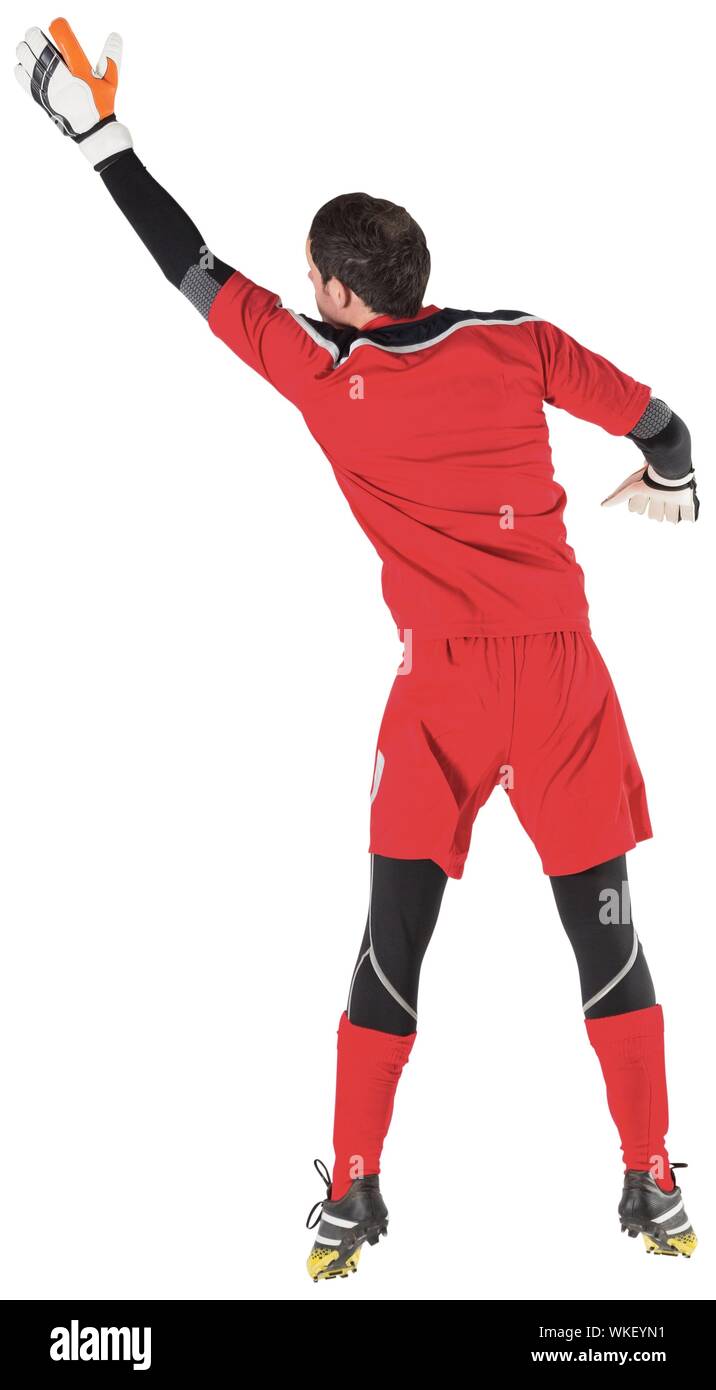 Fit goal keeper jumping up on white background Stock Photo - Alamy