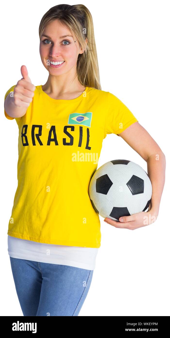 Pretty football fan in brasil t-shirt on white background Stock Photo ...